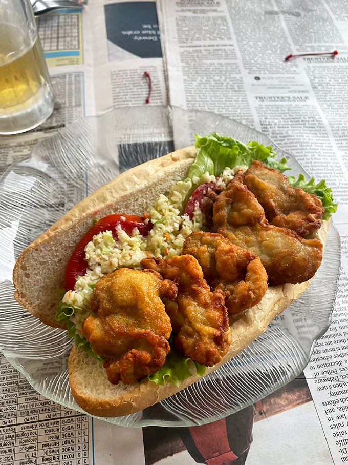 Peel-and-eat shrimp dusted with spices that make each bite a tiny flavor explosion. The double dipping sauce situation? Pure genius.