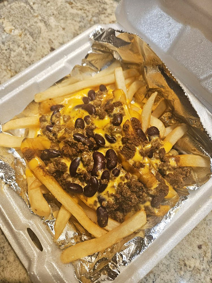 Chili cheese fries that blur the line between side dish and main event&mdash;a perfect example of how this place never skimps on portion or flavor.