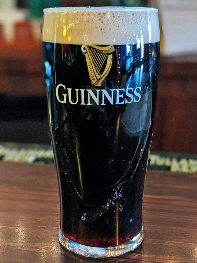 A properly poured Guinness is a work of art &ndash; dark as night with a creamy head that's worth the wait. Patience has never been so rewarding.
