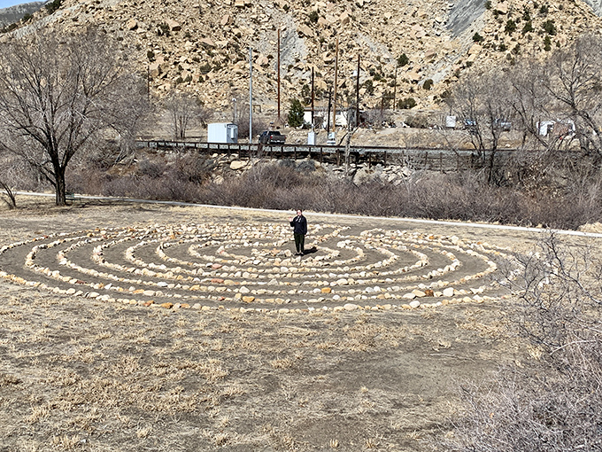 The Helper Labyrinth invites contemplative wandering beneath dramatic cliffs &ndash; proving that sometimes the journey really is the destination.