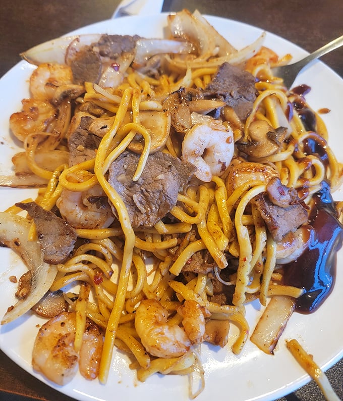 Hibachi noodles intertwined with beef and shrimp &ndash; a relationship more harmonious than most Hollywood marriages and twice as satisfying.