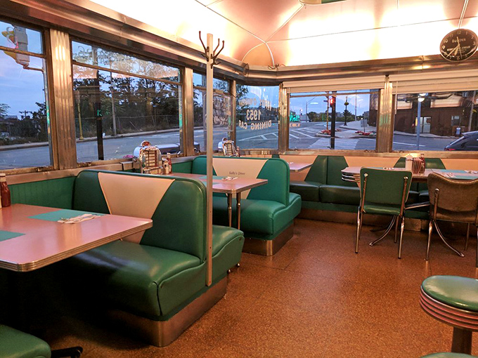 Booths that have heard more neighborhood gossip than a hairdresser on Saturday. The evening light transforms Kelly's into a Edward Hopper painting with better food.