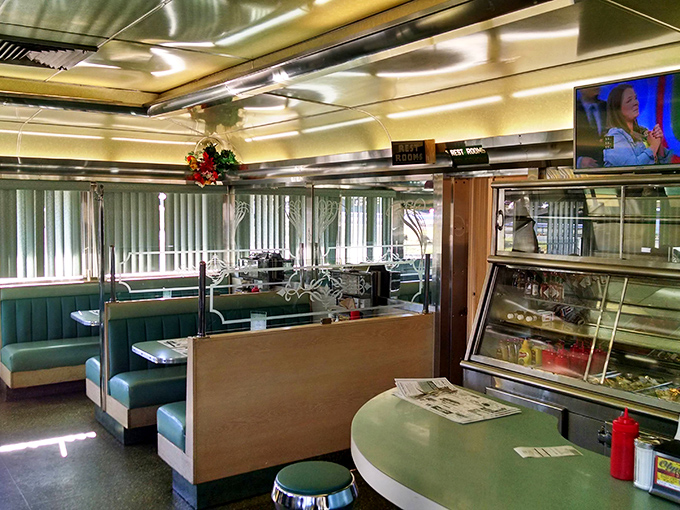 The classic diner layout &ndash; booths on one side, counter on the other, and the promise of good food and conversation floating in between.
