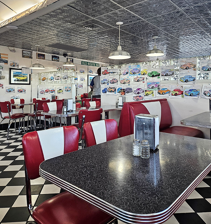 Car memorabilia lines the walls like a museum where you can eat. Every booth offers a different view of America's love affair with the automobile.