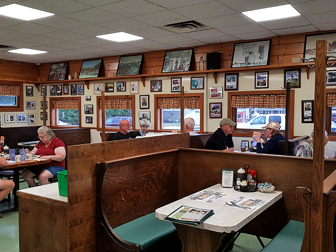 High-backed wooden booths—the original privacy settings. These seats have hosted first dates, family reunions, and everything in between.