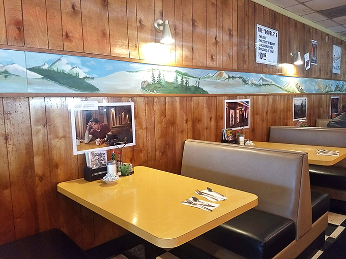 Wood-paneled walls and mountain murals create the perfect backdrop for conversations that meander like nearby hiking trails.