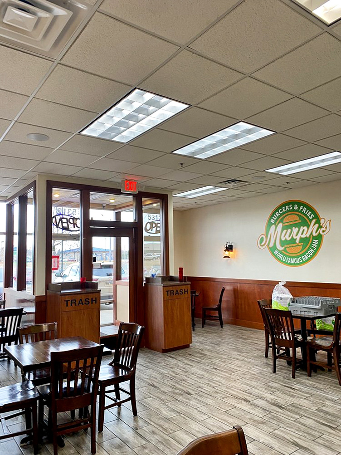 Booth seating, warm lighting, and that signature green&mdash;everything about this space says "relax and enjoy your meal."