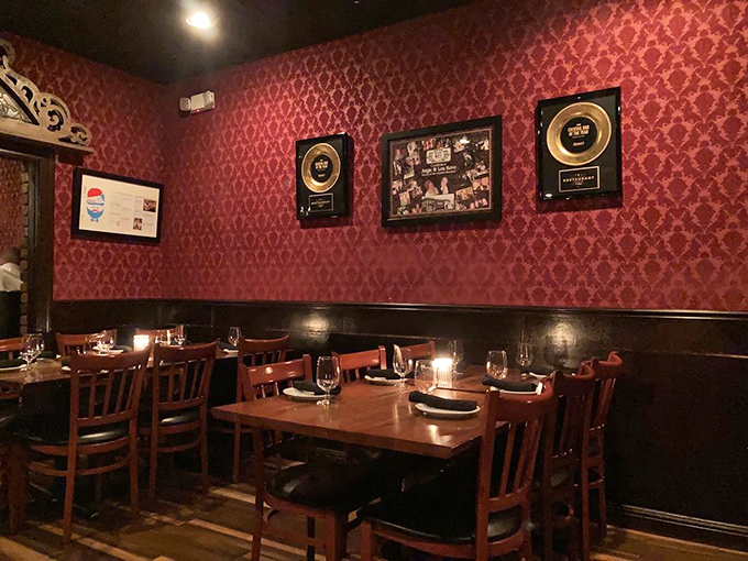 Awards adorn the walls like badges of honor, while the intimate tables create the perfect setting for both first dates and fiftieth anniversaries.