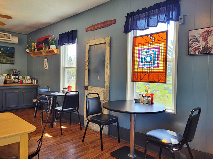 Blue walls, stained glass, and wooden tables create that "grandma's kitchen meets local hangout" vibe that no corporate chain can ever replicate.