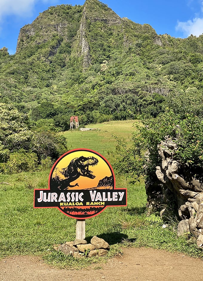 Not your average park entrance! Kualoa Ranch's Jurassic Valley sign promises prehistoric adventures in landscapes that actually starred in the films.