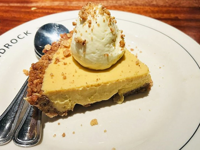 Key lime pie that strikes the perfect balance between tart and sweet, topped with a cloud of whipped cream.