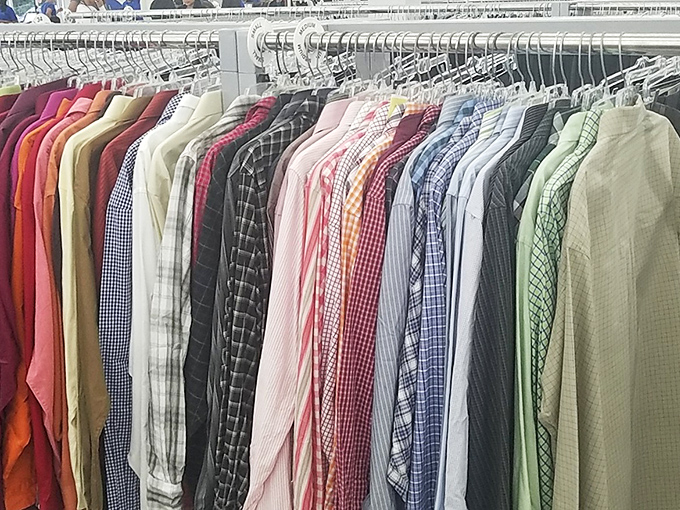 Men's shirts arranged in a chromatic symphony. From job interview-ready to casual Friday, all at prices that won't button-up your budget.