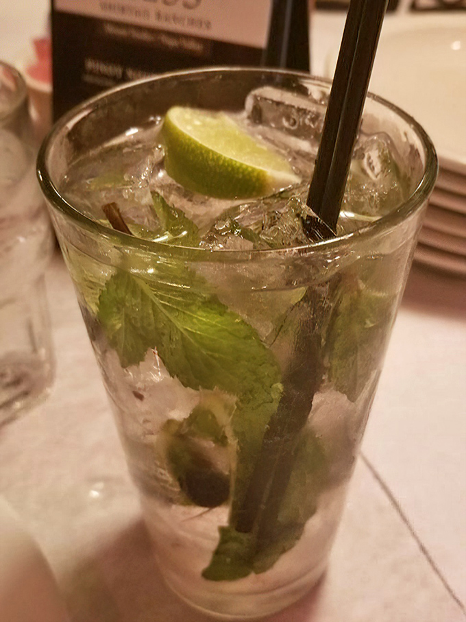 A proper mojito with fresh mint and lime&mdash;the kind of cocktail that makes you contemplate moving somewhere tropical permanently.