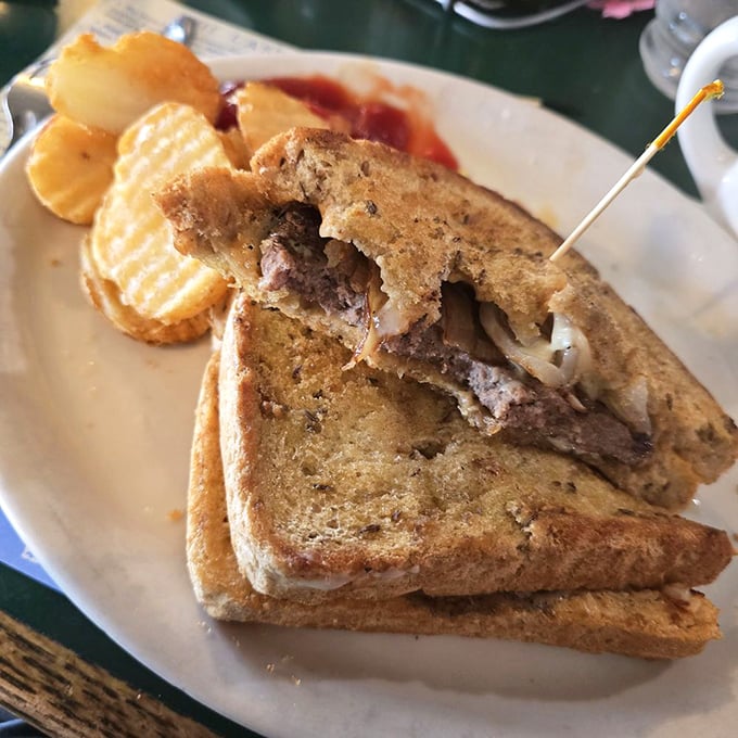 This patty melt has layers like a good novel&mdash;crispy bread, melty cheese, and a burger that's clearly the protagonist of this delicious story.
