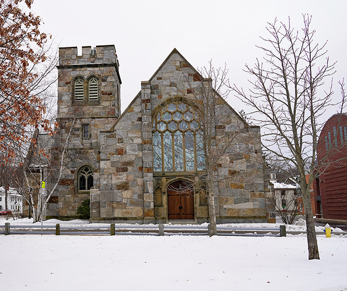 Phillips Church in winter looks like it belongs on a holiday card, stone walls standing strong against New Hampshire's seasonal mood swings.