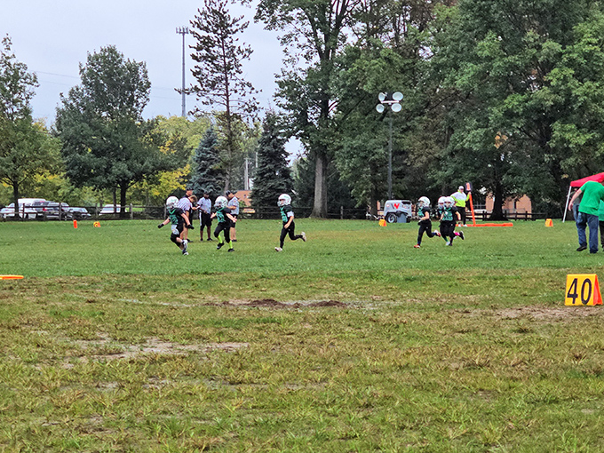 Saturday youth football in Marietta: where future high school legends are born and grandparents cheer with the passion of Super Bowl fans.