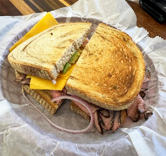 A sandwich that demands to be photographed before eaten, then devoured too quickly to remember taking the picture. The marble rye is just showing off.