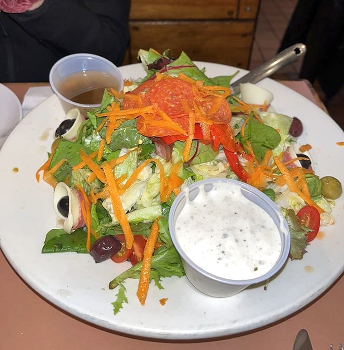 Even the salad gets the star treatment. Fresh, colorful, and substantial enough to silence the "I just want something light" crowd.