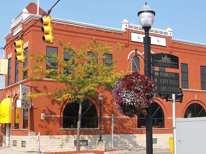 This historic brick building with hanging flower baskets isn't just city hall &ndash; it's the heart of local democracy dressed in its Sunday best.
