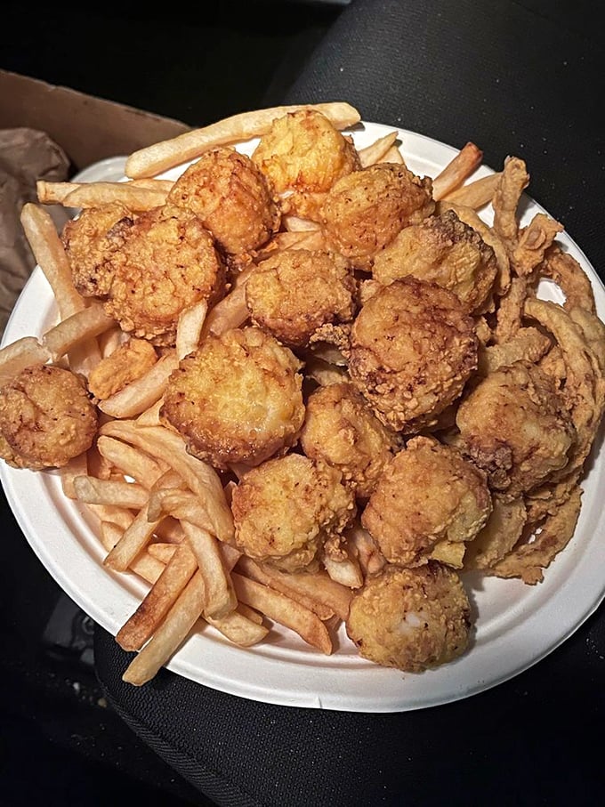 Scallops wearing their golden-brown formal attire, ready for their grand entrance into the gala event happening in your mouth.