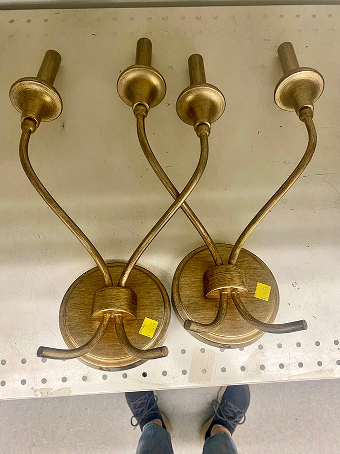 Brass wall sconces that look straight out of a 1920s speakeasy. Just add dim lighting and jazz for instant atmosphere.