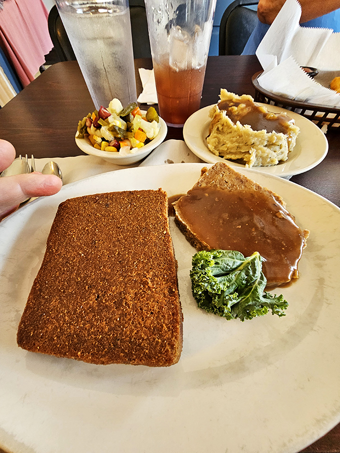 The holy trinity of Pennsylvania Dutch comfort: scrapple, meatloaf, and potato filling with a side of chow chow. Grandma would approve.