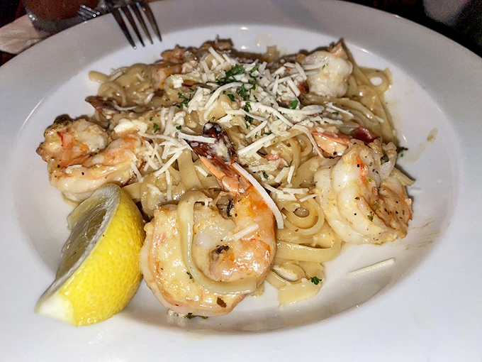 Shrimp scampi that makes you want to twirl pasta dramatically while making "mmm" noises. The lemon wedge isn't optional.