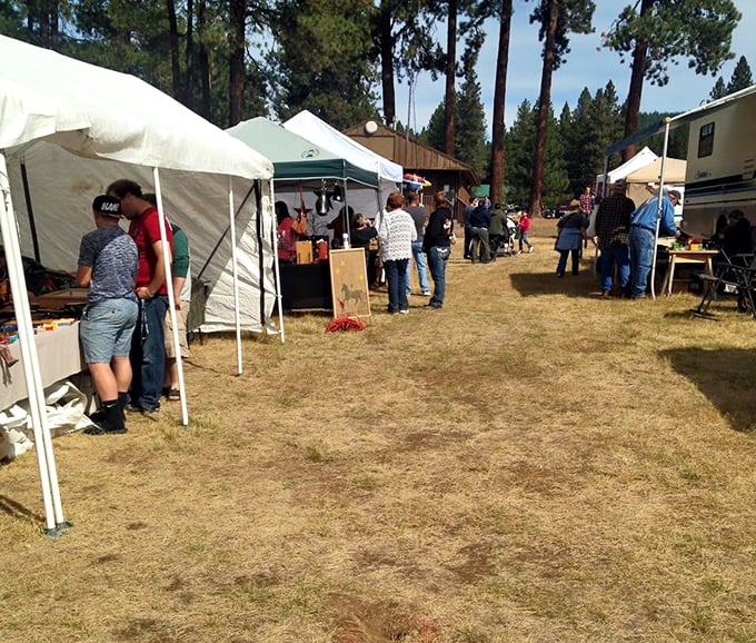 Treasure hunters of a different sort browse the famous Sumpter Flea Market, where one person's castoffs become another's prized discoveries under the summer sun.