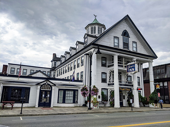 The historic Thayers Inn has welcomed travelers since the 1850s, its columned facade promising New England hospitality at its finest.