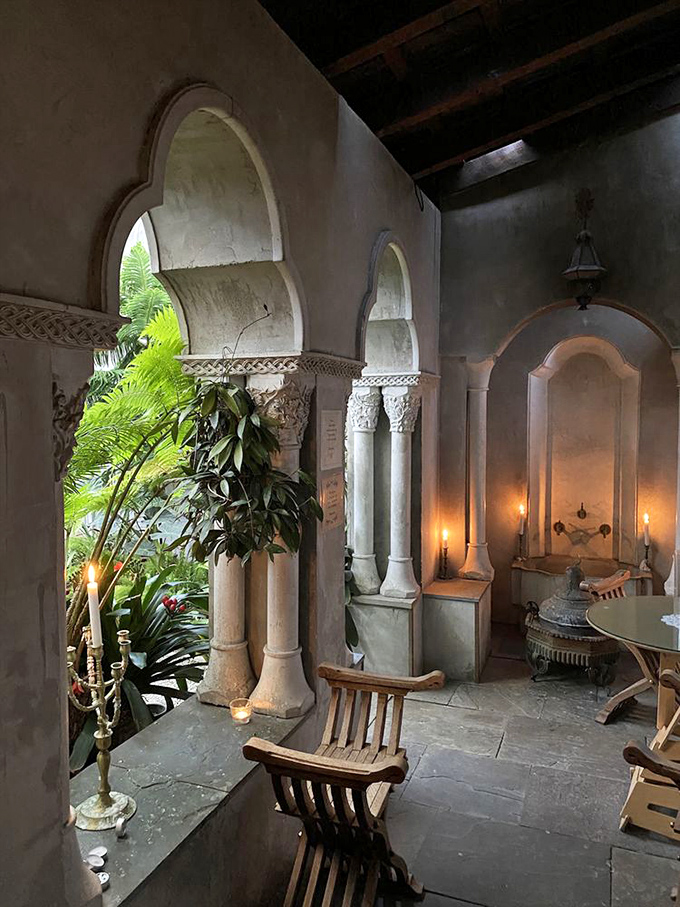 Moorish arches and candlelight transform this upstairs terrace into something straight out of a romantic fever dream.