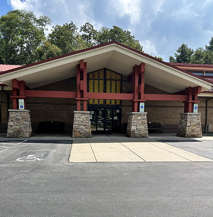 Not just a library but a community living room, where stories find their readers beneath a roof that mirrors the mountain peaks.