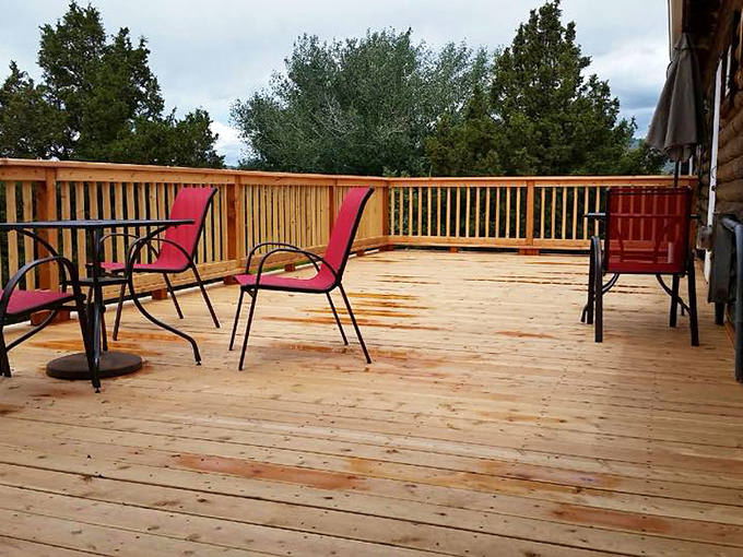 The outdoor deck doesn't just offer seating&mdash;it provides front-row tickets to Montana's greatest show: the great outdoors itself.