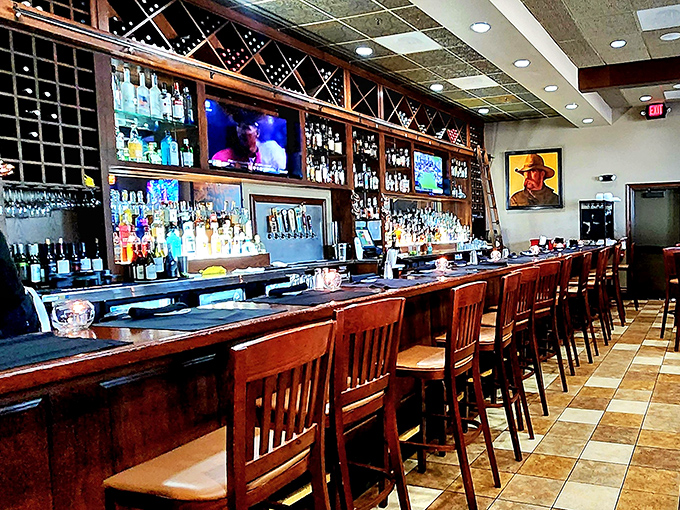 The bar area—where bourbon meets beef in a marriage so perfect it should have its own reality show.