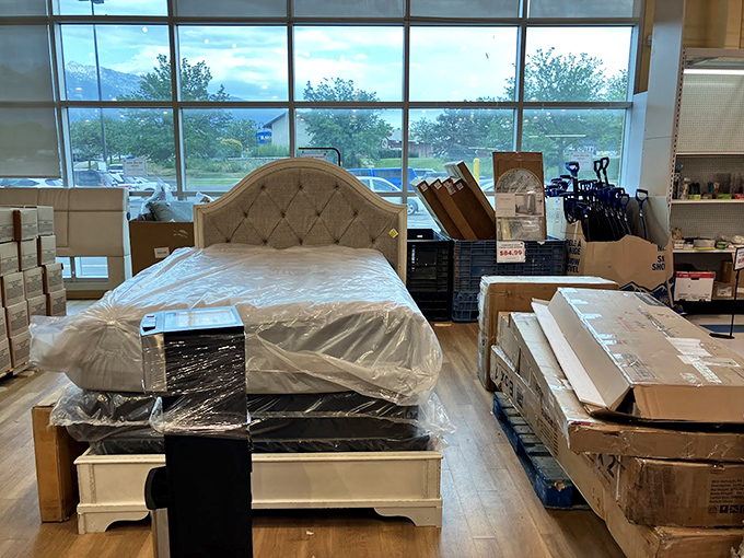 A bedroom set displayed against Utah's mountain backdrop &ndash; proof that you can have both majestic views and affordable furniture in the same day.
