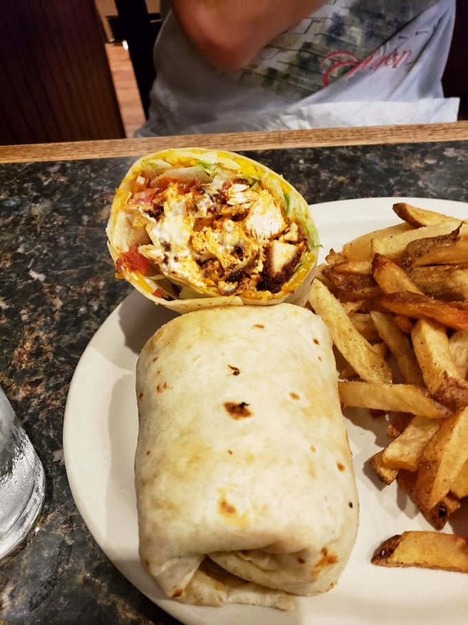 A wrap that actually stays wrapped! Buffalo chicken bringing the heat while crisp vegetables cool things down &ndash; it's thermal dynamics you can eat.