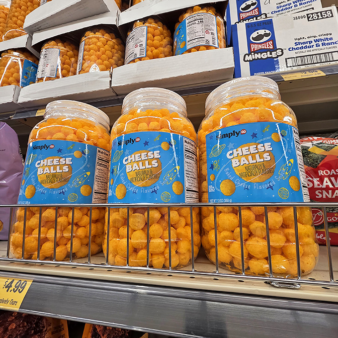 Cheese balls in their natural habitat: gloriously orange, unapologetically artificial, and mysteriously irresistible. The snack equivalent of a guilty pleasure reality show.