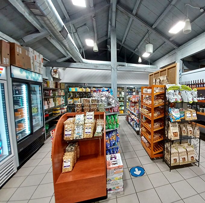 Grocery essentials meet gourmet offerings in aisles that somehow bridge two worlds&mdash;practical Maine sensibility with unexpected culinary flair.