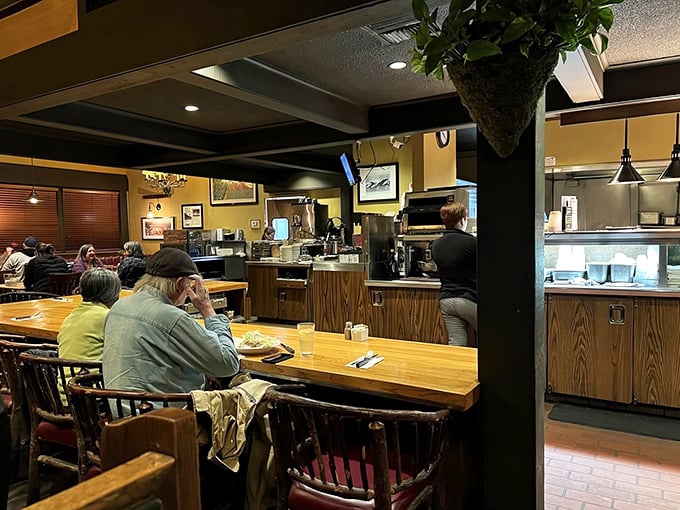 Counter seating gives you front-row access to the breakfast magic, where you can watch the kitchen orchestrate morning miracles.