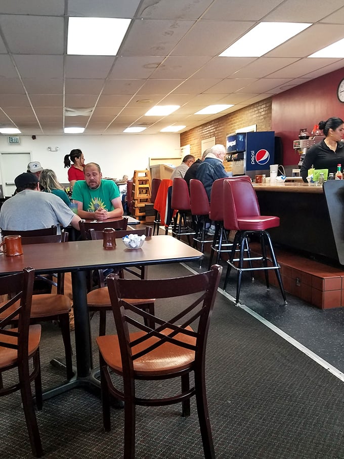 Where locals gather to solve the world's problems over coffee and eggs—the true American town hall.