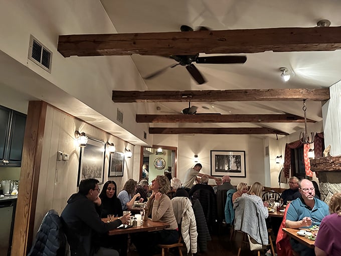 A bustling evening at The Anchor where locals and visitors gather under wooden beams to share stories and seafood in equal measure.