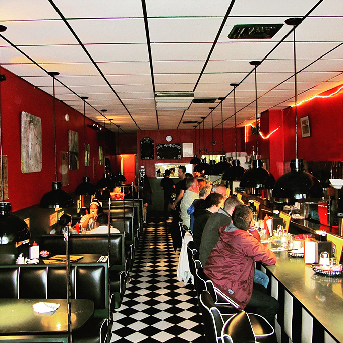 Where Seattle's tech billionaires and construction workers sit elbow-to-elbow, united by the universal language of good coffee.