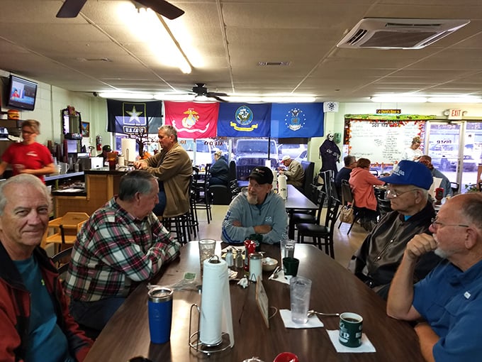 Military flags hang proudly as veterans share stories over breakfast&mdash;the true heart of small-town America.