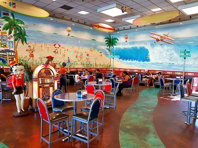 The dining area feels like a surf museum with memorabilia covering every wall—nostalgia you can eat with a side of fries.