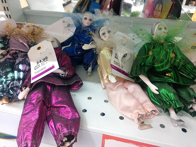 Porcelain performers in metallic finery wait in the wings, ready to bring a touch of theatrical absurdity to someone's curio cabinet.