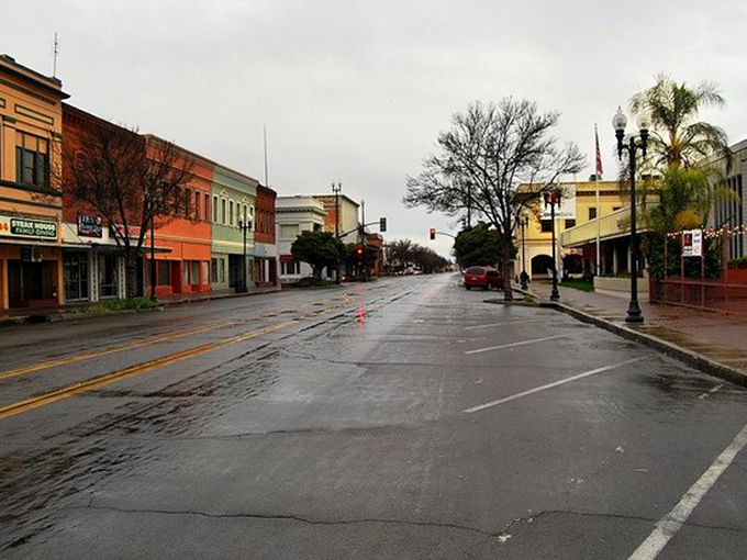 Downtown Porterville after rain captures that rare California moment &ndash; empty streets, vintage buildings, and not a parking meter in sight.