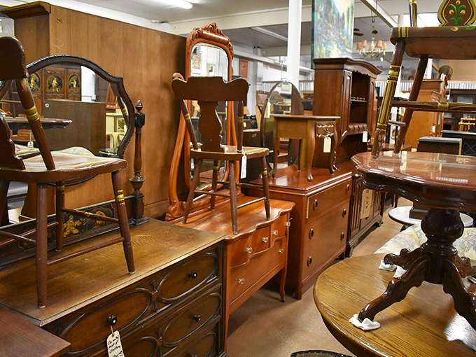 Wood grain tells stories in this furniture forest&mdash;each dresser drawer once held someone's treasures, now waiting for yours.