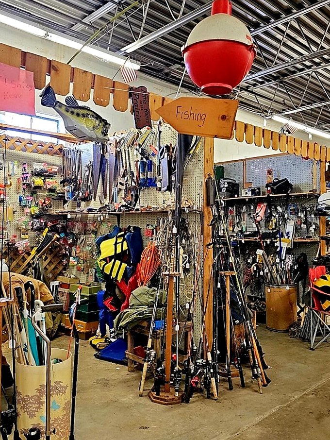 Angler's alley, where fishing dreams are born. That giant bobber overhead seems to say, "The big one won't catch itself, folks!"