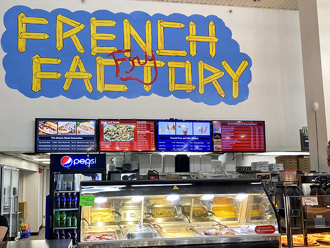 The "French Factory" sign promises fried potato perfection. In the hierarchy of food court offerings, few things rank higher than well-executed fries.