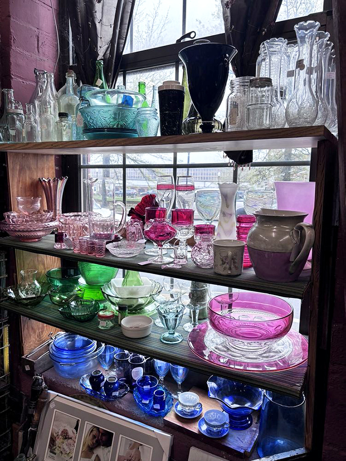 Depression glass catches the light in a rainbow of colors &ndash; pink, green, blue &ndash; each piece holding memories of dinner tables long ago.