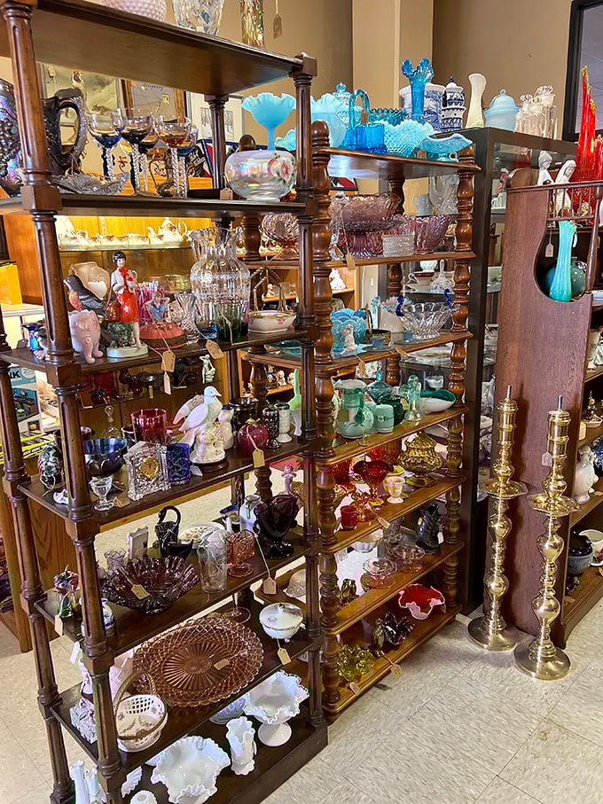 A wooden showcase of glass treasures catching light like a kaleidoscope. Grandma's special occasion dishes, now ready for your table.